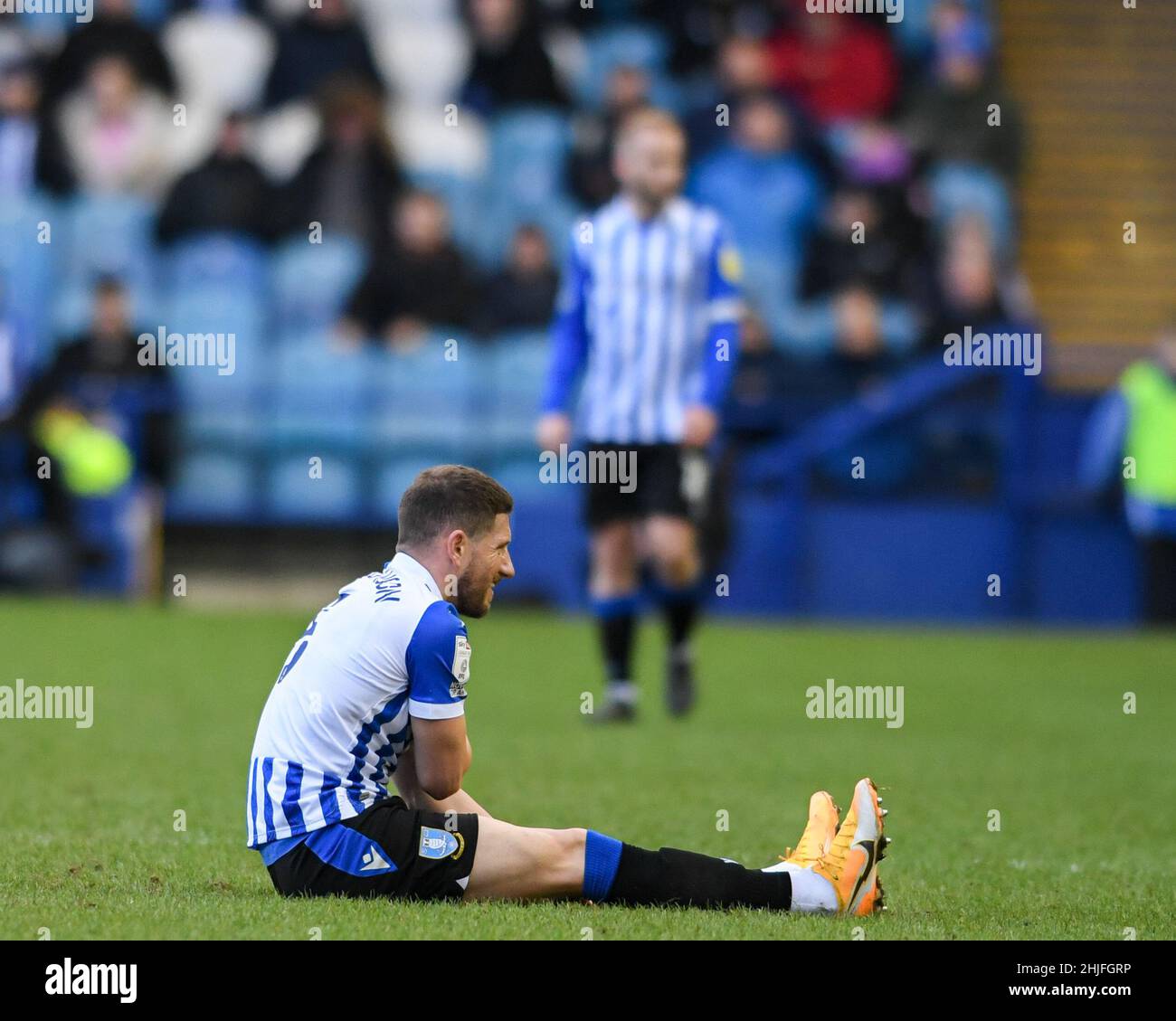 Sam Hutchinson #5 of Sheffield Wednesday sits on the pitch after ...