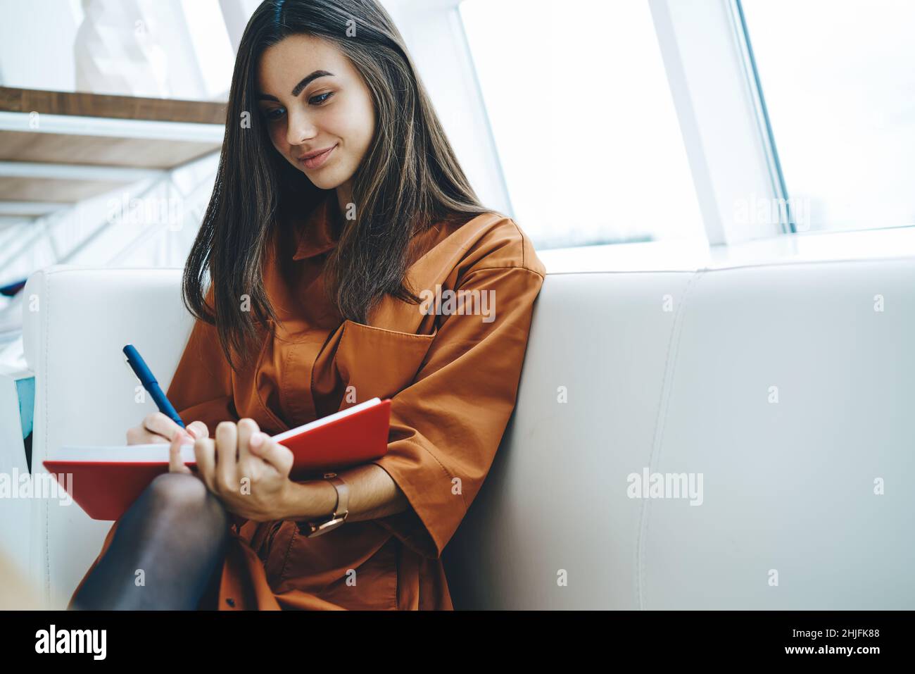 Woman take note on notebook hi-res stock photography and images - Alamy