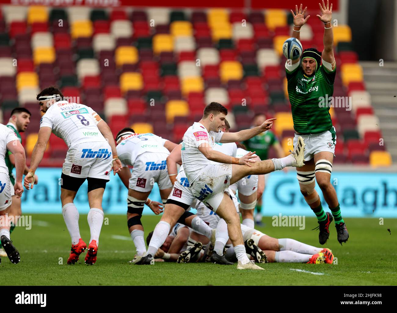 Exeter Chiefs Jack Maunder and London Irish Adam Coleman in action ...