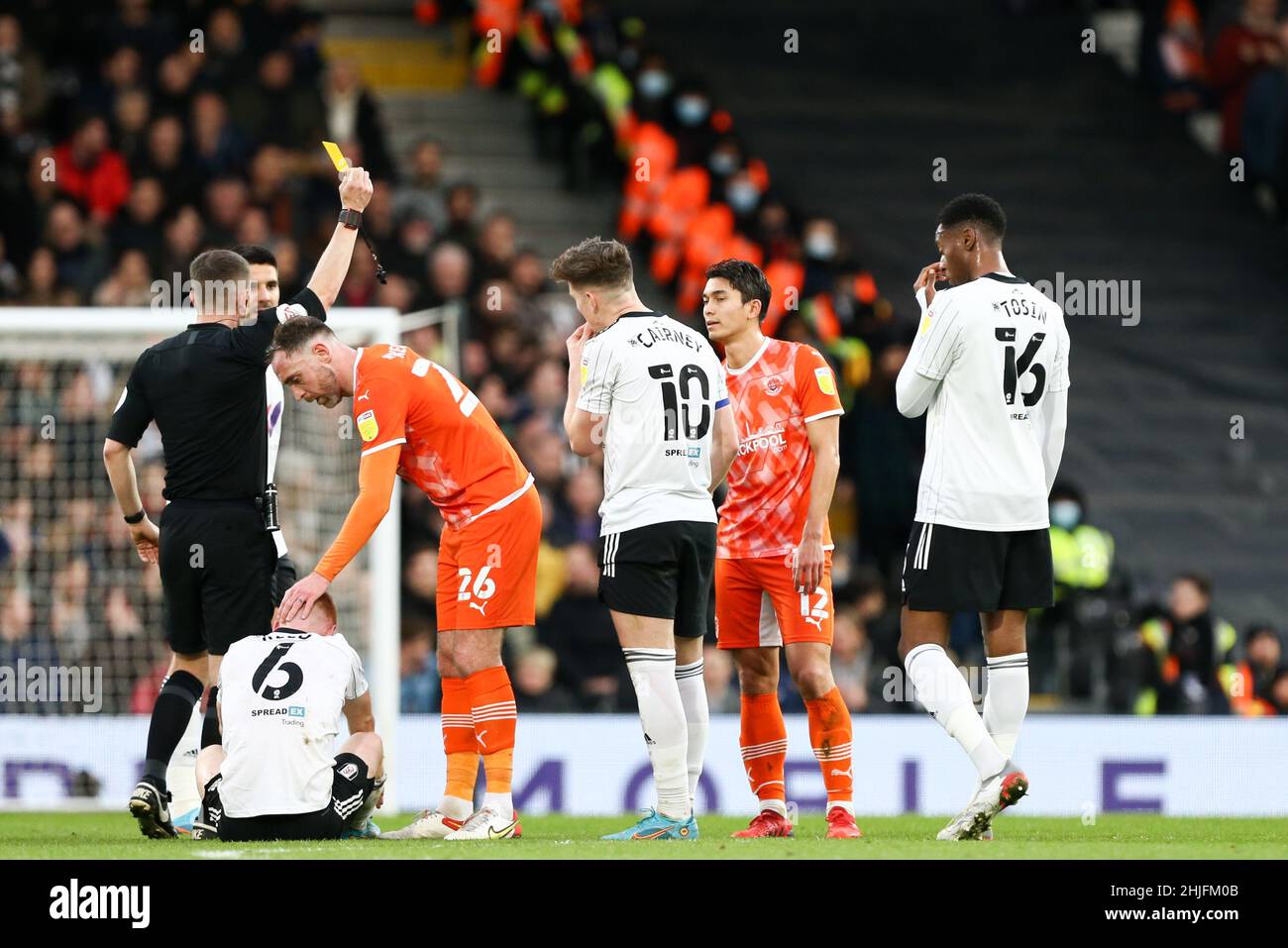 London, UK. 29th Jan, 2022. Kenny Dougall #12 of Blackpool is shown a ...