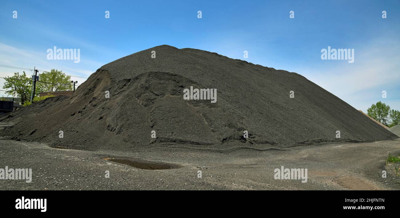Large industrial mound of gravel,sand,asphalt & macadam or road ...