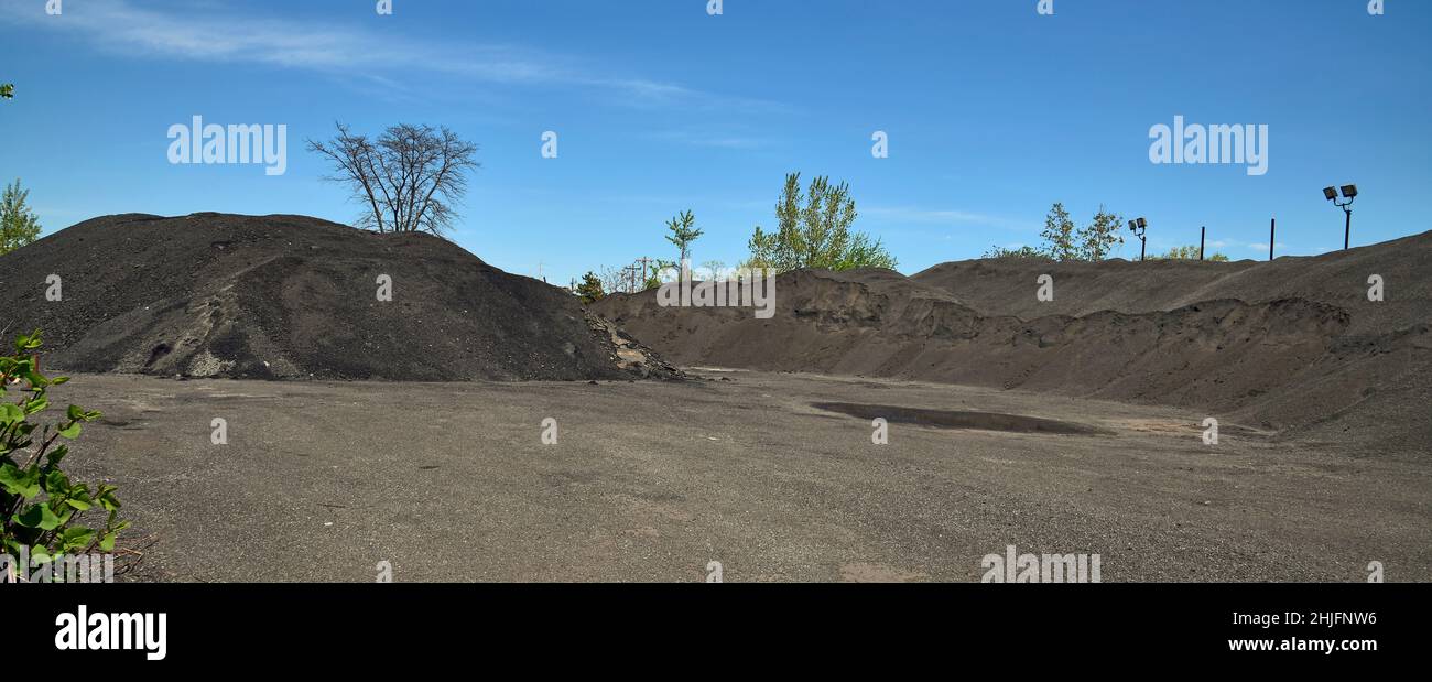 Large industrial mound of gravel,sand,asphalt and macadam or road ...