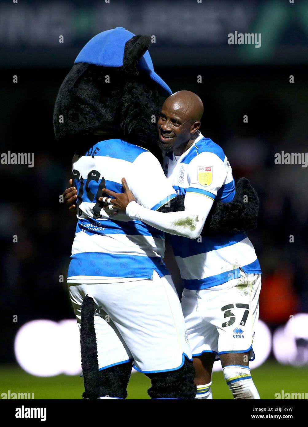 Queens Park Rangers' Albert Adomah celebrates with mascot Jude The Cat ...