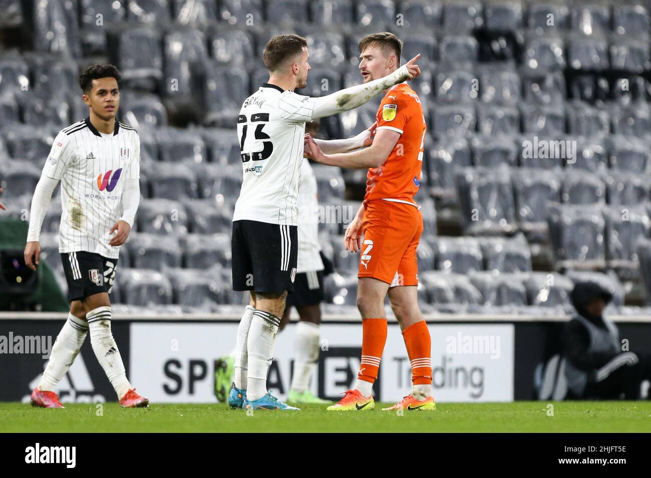 Callum Connolly #2 of Blackpool gets involves with Joe Bryan #23 of ...