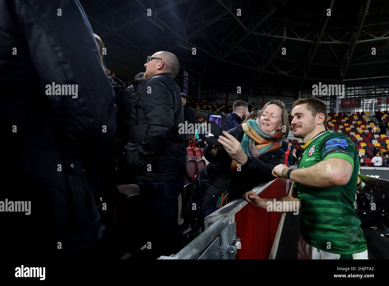 London Irish Paddy Jackson poses with fans at full time during the ...