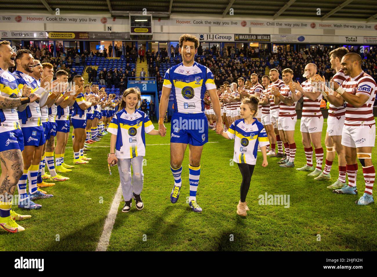 Stefan Ratchford (1) of Warrington Wolves and his children walk out to ...