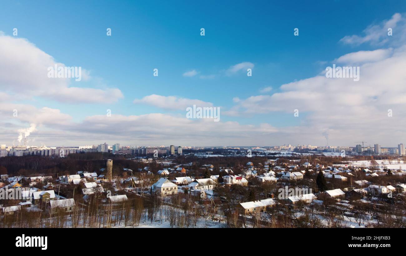 Low-rise urban development. The ground and buildings are covered with ...