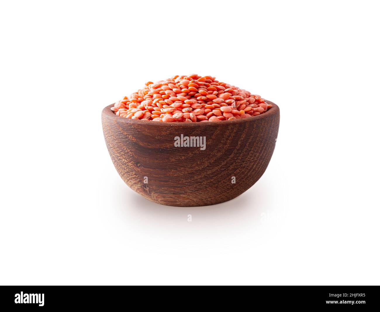 Red lentils in wooden bowl isolated on white background with clipping ...