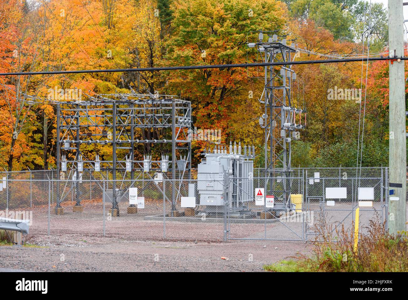 Electric substation with colourful autumn trees in background Stock ...