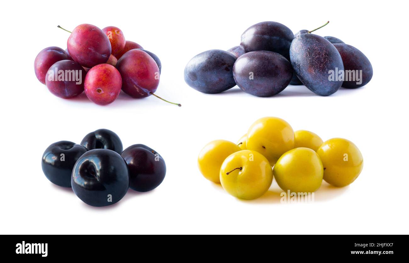 A heap of plums cut out on a white background. Purple, blue, yellow and ...