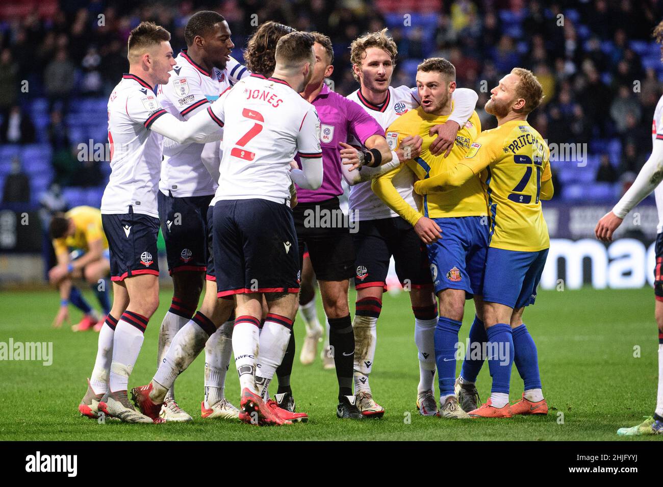 BOLTON, UK. JAN 29TH Tempers fray between the teams as the match draws ...