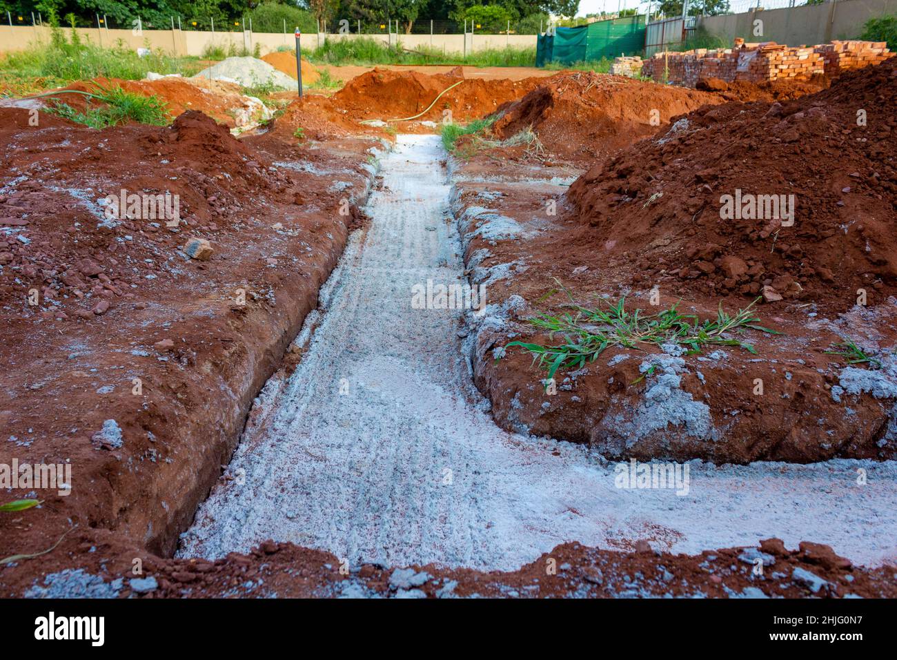L shaped concrete foundations for a building that is about to be build ...