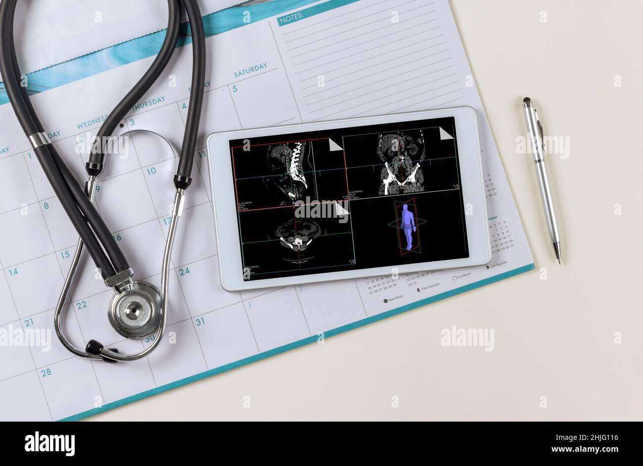Doctor medical worktable with stethoscope on research in medicine MRI ...