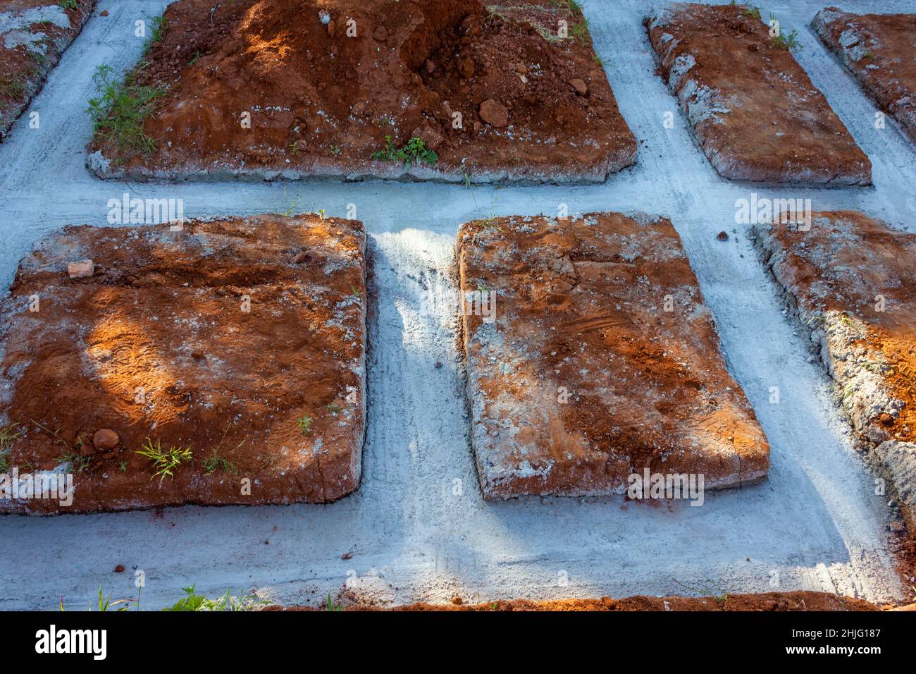 Top view of the foundation trenches of a new building that is filled ...