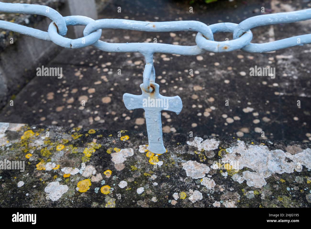 cross on a chain as a symbol of family continuity, Consell Cemetery ...