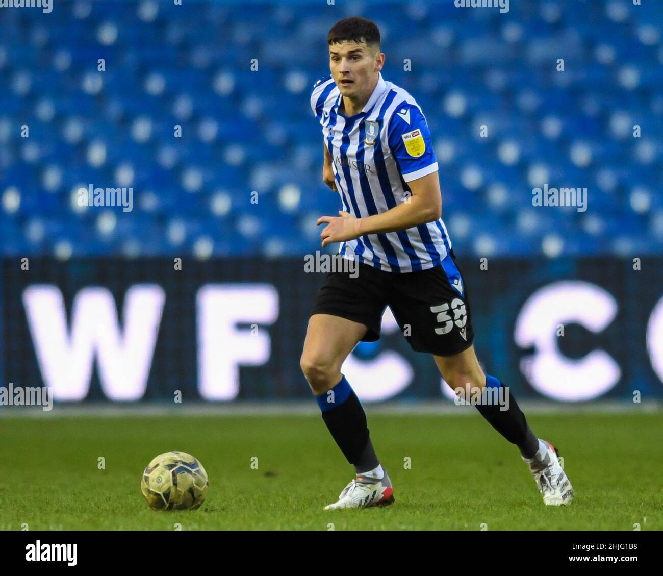 Jordan Storey #38 of Sheffield Wednesday runs with the ball Stock Photo ...