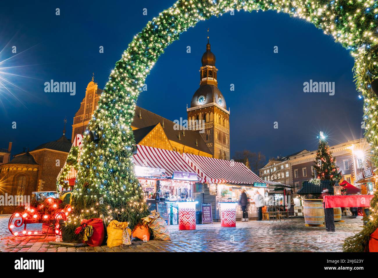 Riga, Latvia. Christmas Market On Dome Square With Riga Dome Cathedral ...