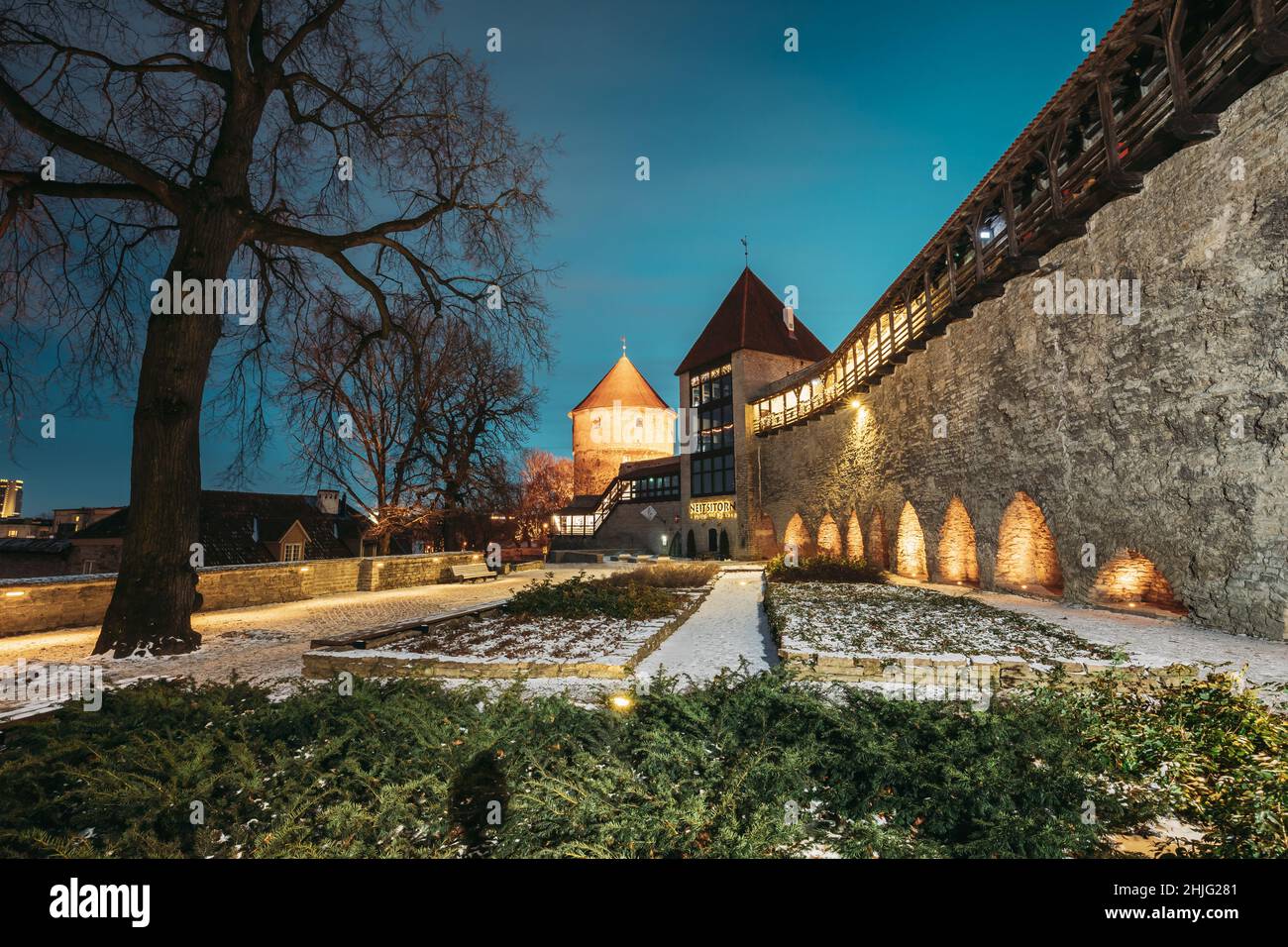 Tallinn, Estonia. Medieval Tower Neitsitorn At Winter In Evening Night ...