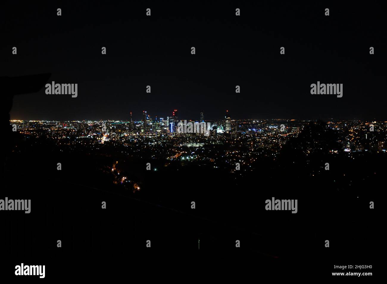 Cityscape of Mount Coot-tha covered in lights at night in Queensland ...