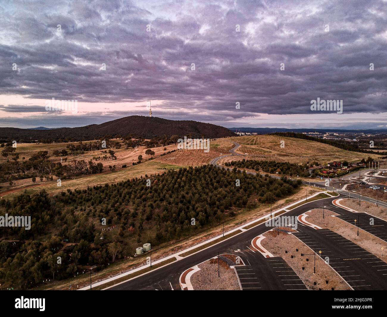 Landscape of the National Arboretum Canberra under a stormy sky in ...