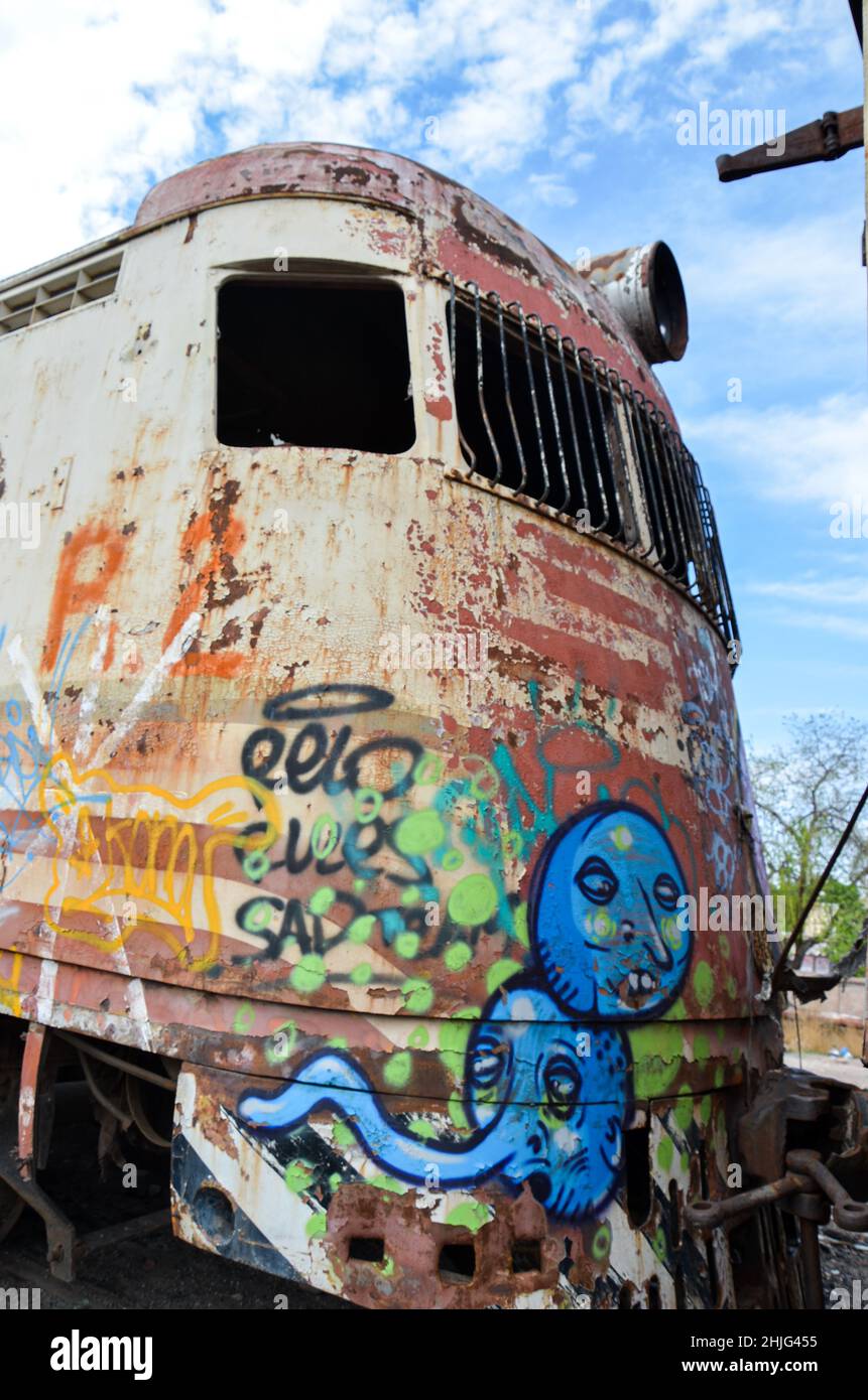 Abandoned old train with rust and graffitis Stock Photo - Alamy