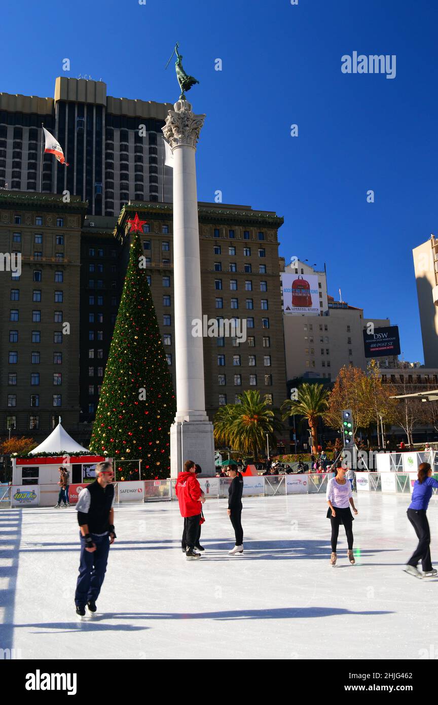 Folks enjoy an outdoor skating rink in Union Square, San Francisco ...