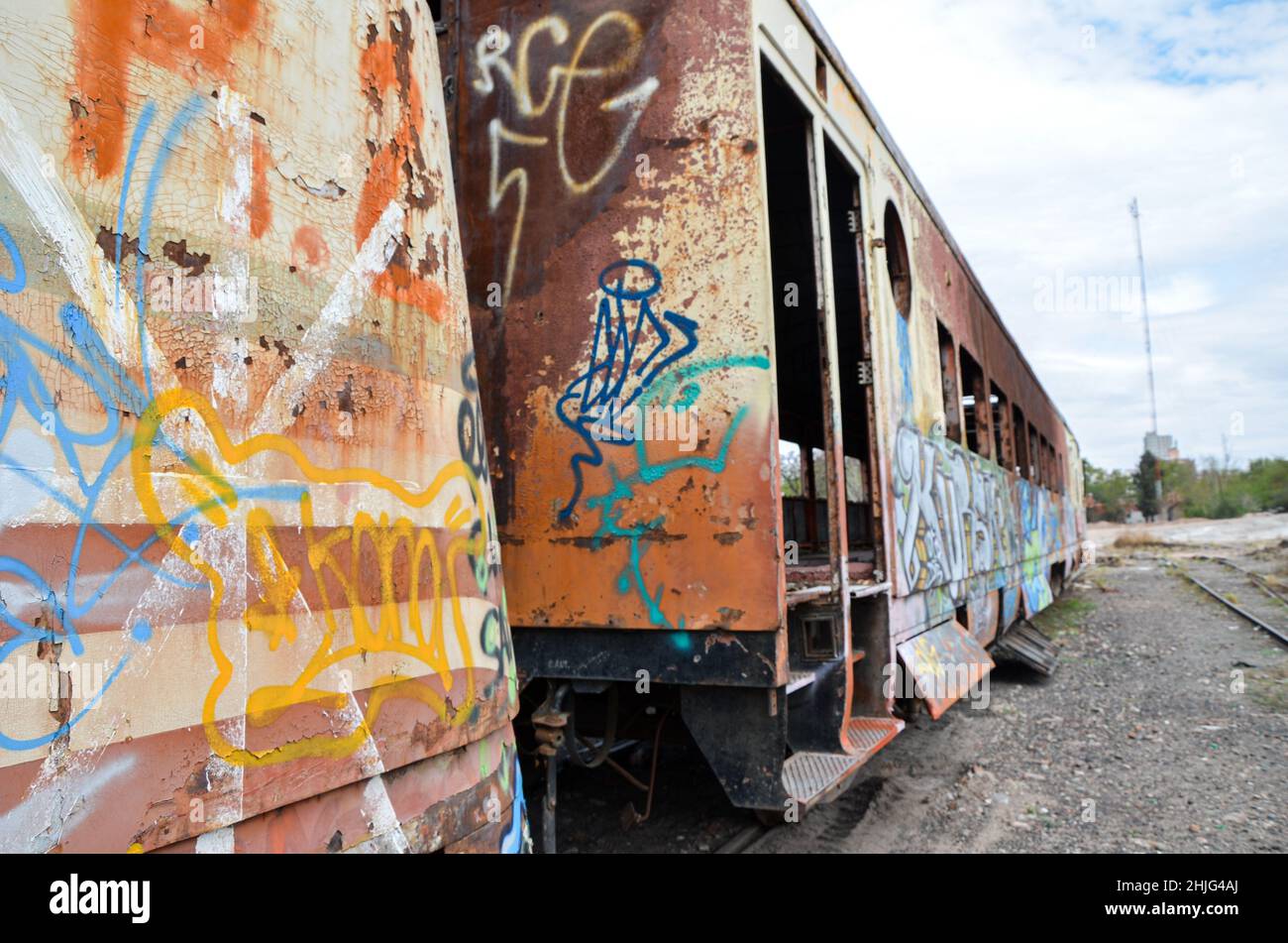 Abandoned old train with rust and graffitis Stock Photo - Alamy