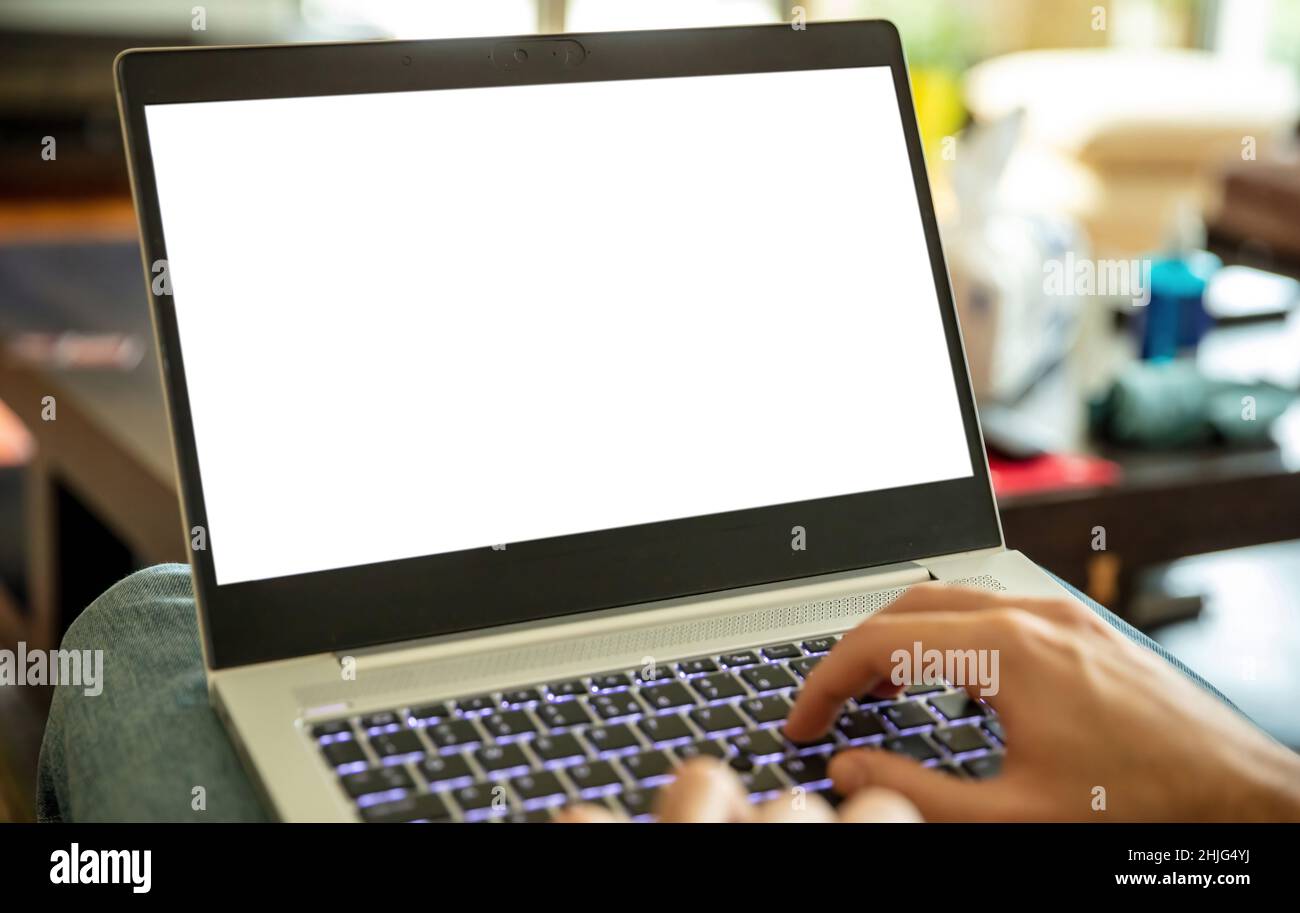 Man work at home office, blank screen laptop computer. Open notebook on ...