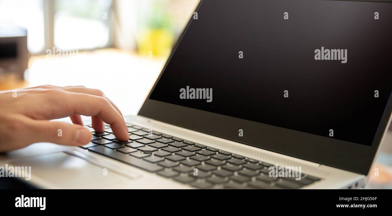 Man work at home office, open notebook, Male hand typing on laptop ...