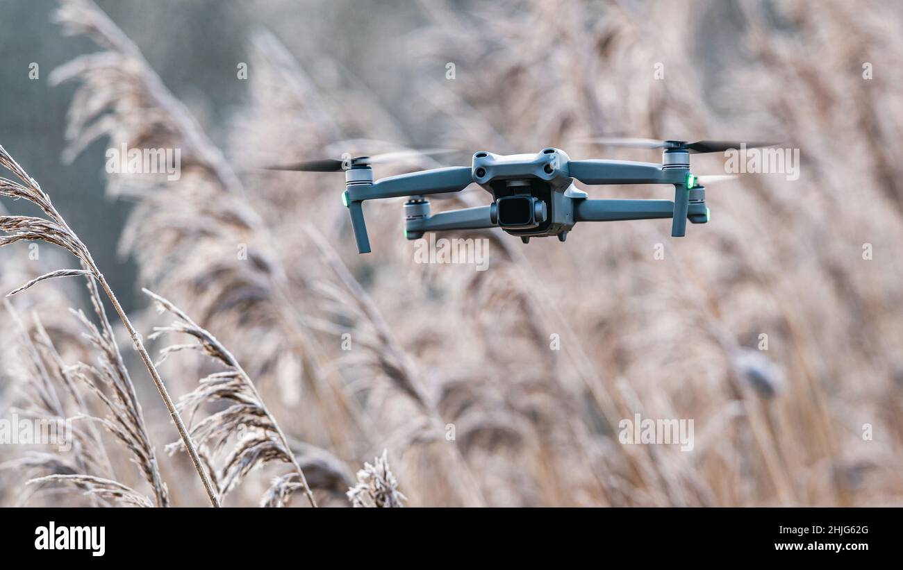 Drone in flight over marshland, Devon, England Stock Photo - Alamy
