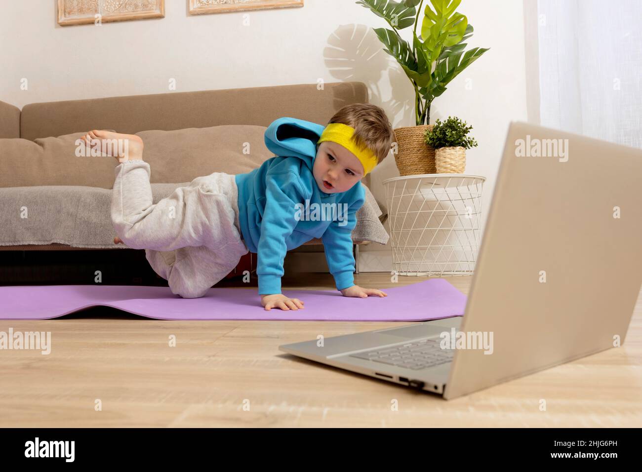 Child doing yoga hi-res stock photography and images - Alamy