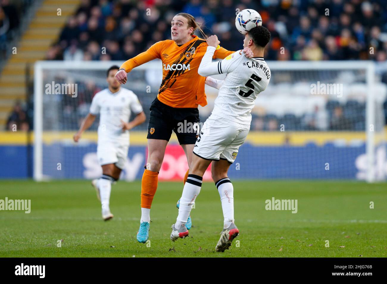 Ben Cabango #5 of Swansea City and Tom Eaves #9 of Hull City Stock ...