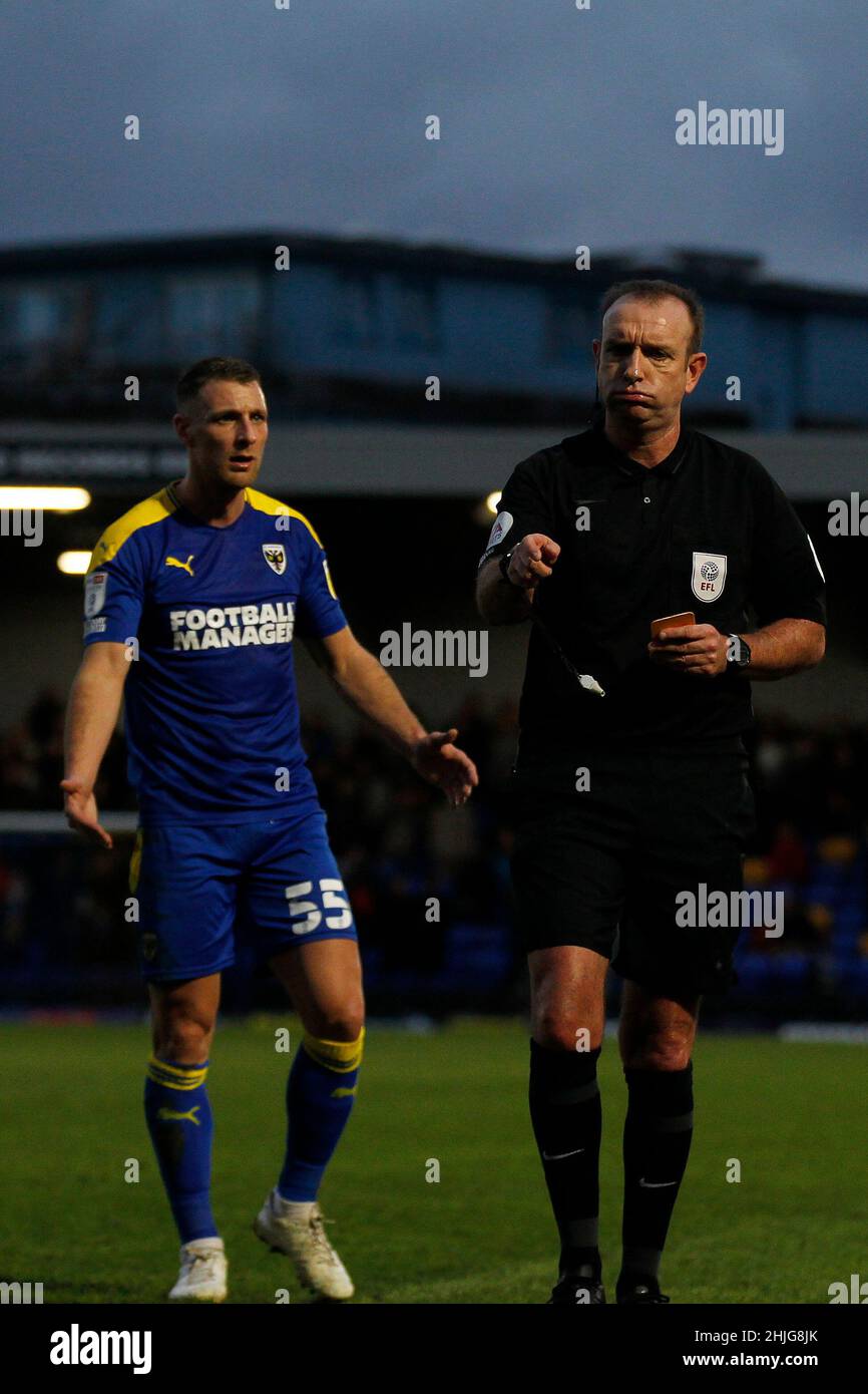 Referee, Carl Boyeson summons Elliott Bennett #17 of Shrewsbury Town ...