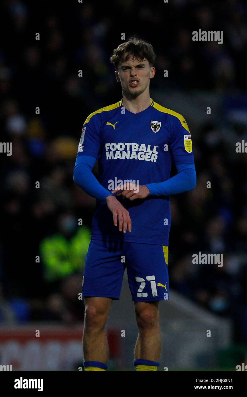 Luke McCormick #21 of AFC Wimbledon reminds referee, Carl Boyeson to ...