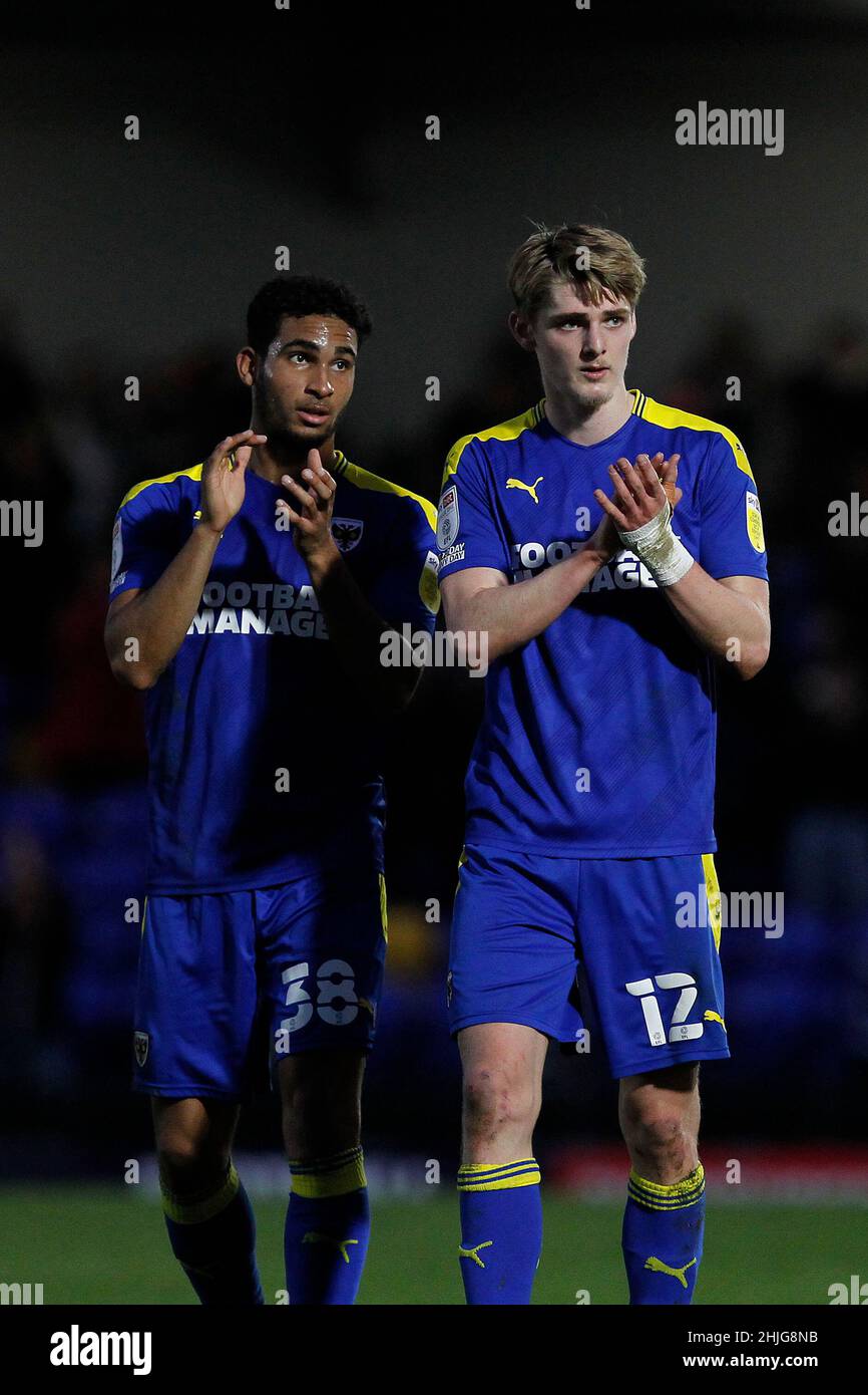 Jack Rudoni #12 of AFC Wimbledon and Aaron Cosgrave #38 of AFC ...