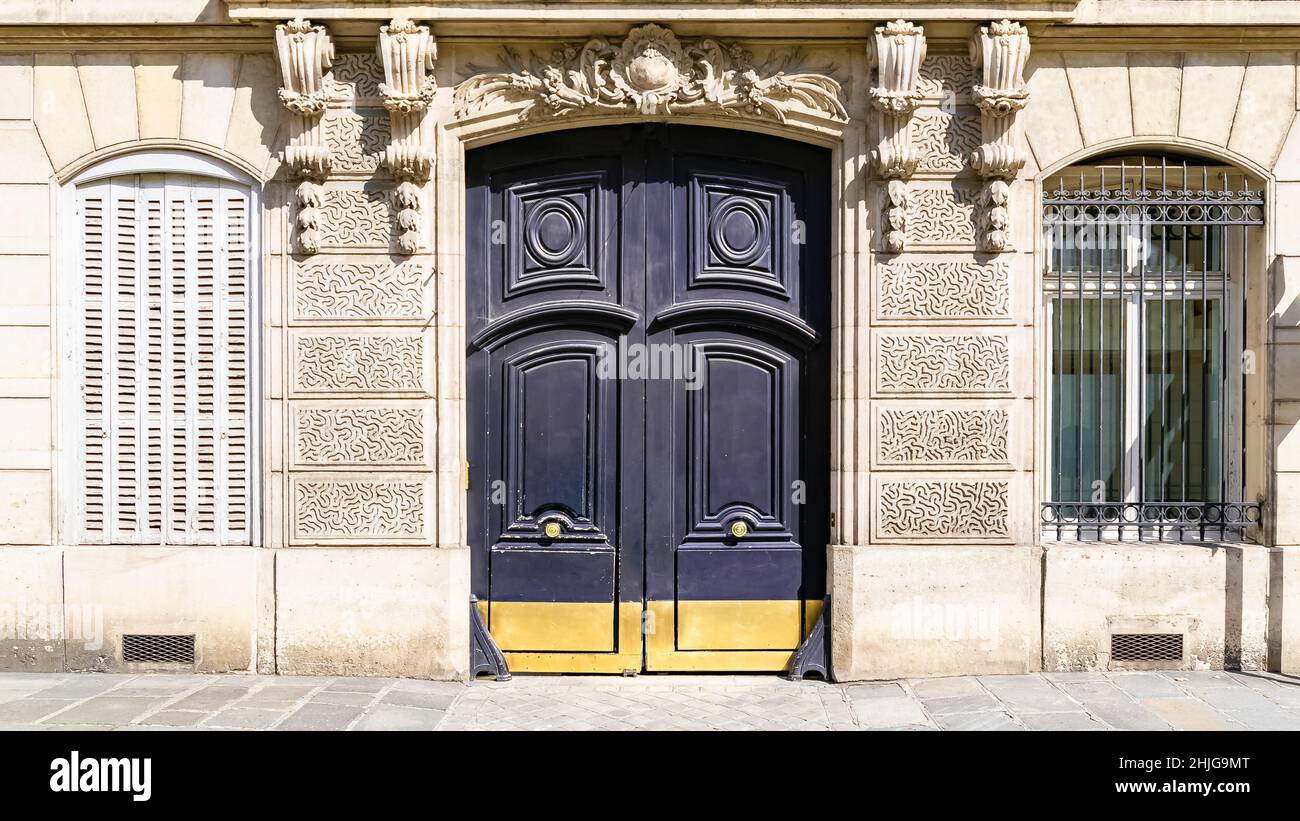 Paris, a wooden door, typical building in the 7th arrondissement, a ...