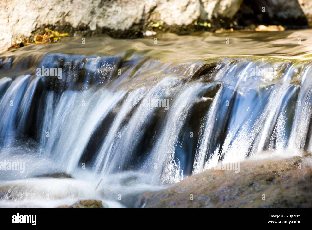 Long exposure waterfall cascades over rocks with multiple streams Stock ...