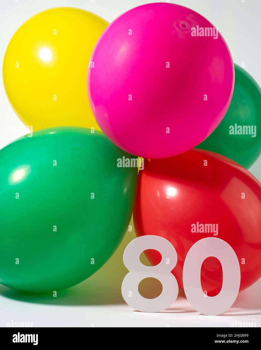 Number 80 and colourful round balloons. Birthday, anniversary, jubilee ...