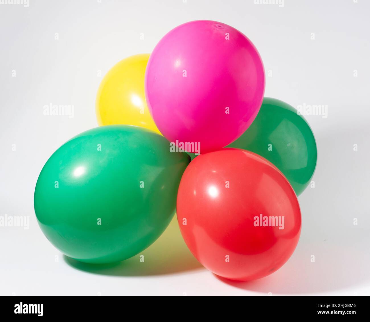 Colorful round balloons bunch isolated on white background. Birthday ...