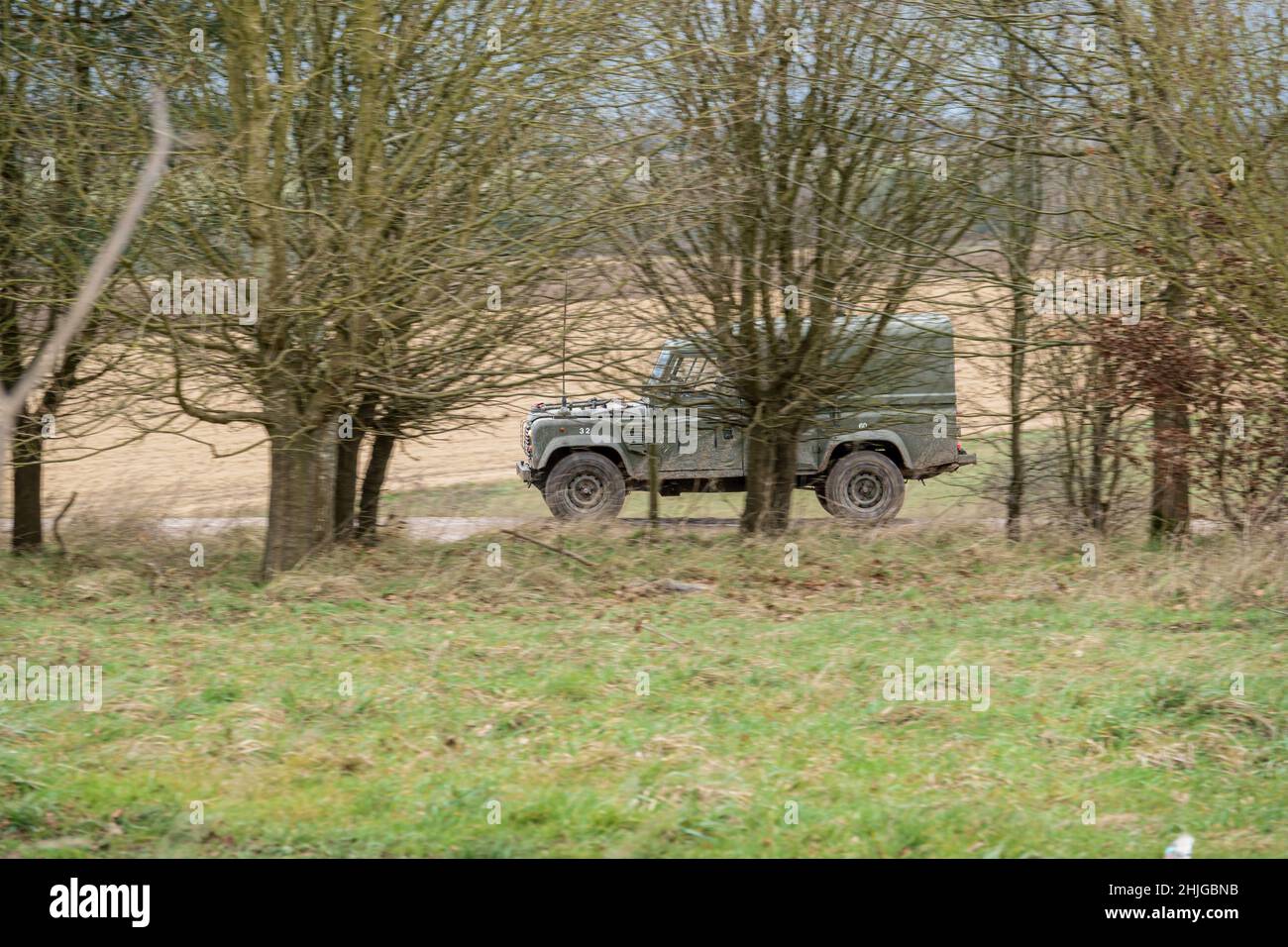 British Army Land Rover Defender Wolf medium utility vehicle travelling ...