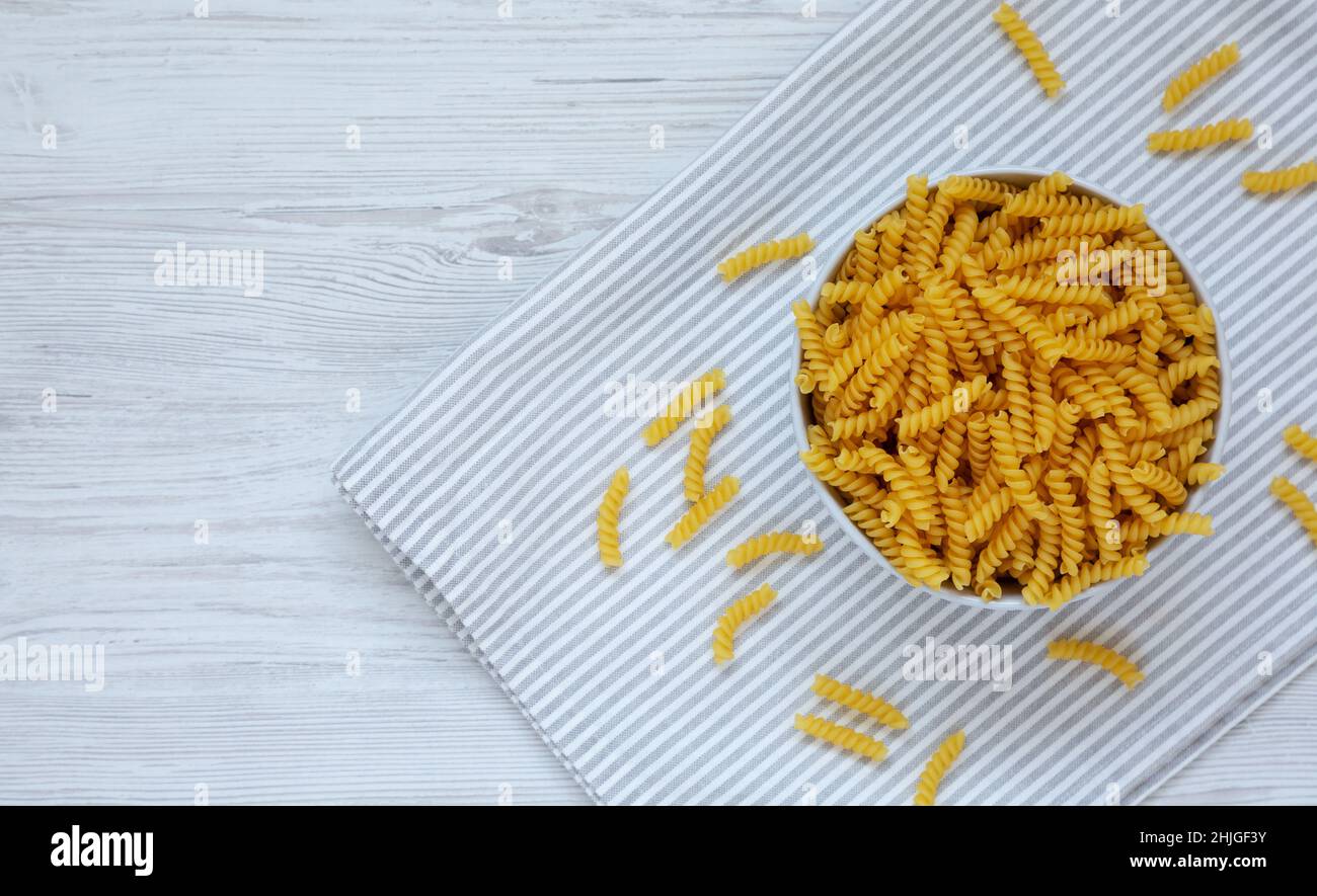 Raw Dry Organic Rotini Pasta Ready to Cook. Top view, from above, flat ...