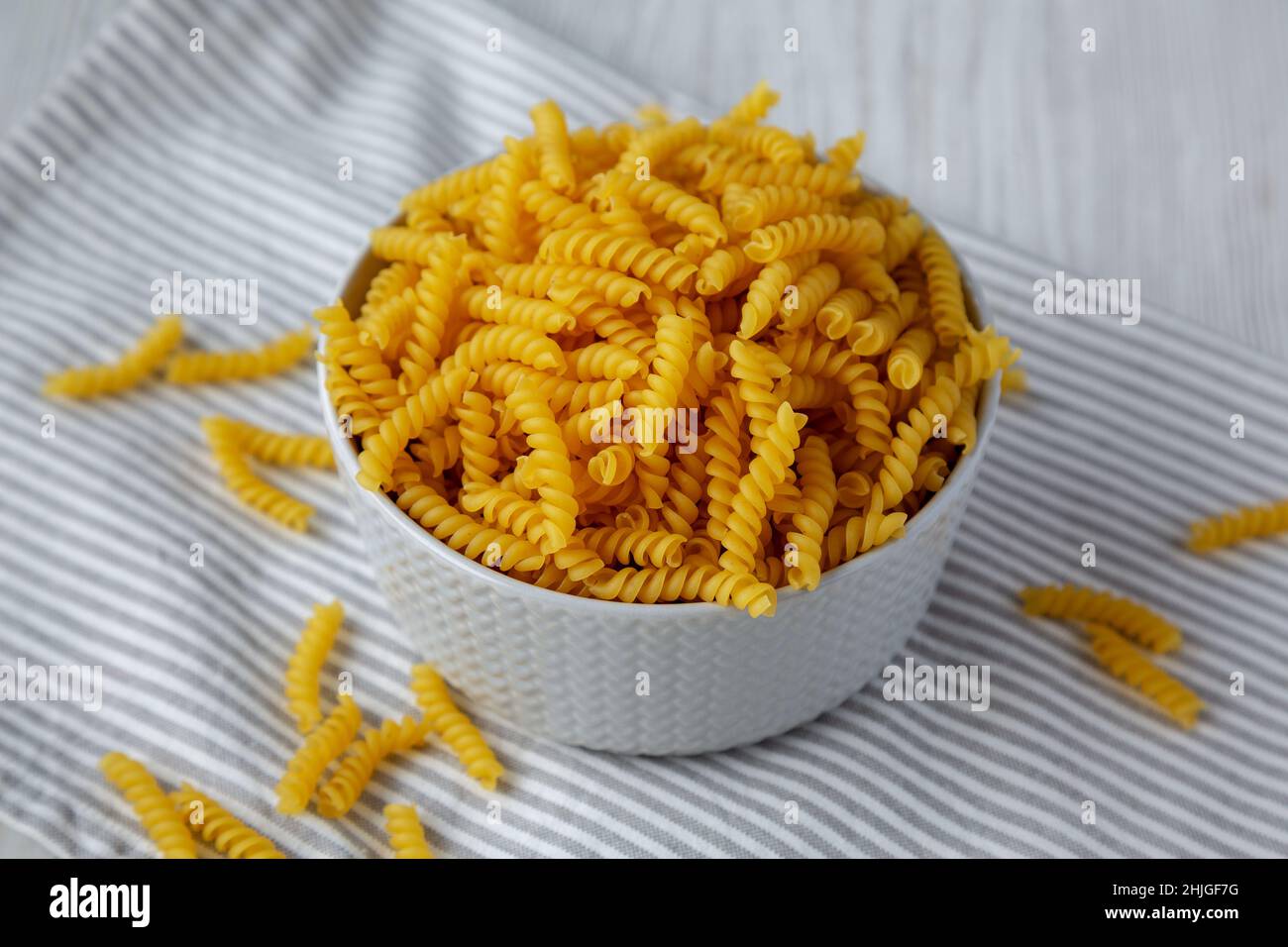 Raw Dry Organic Rotini Pasta Ready to Cook, side view Stock Photo - Alamy