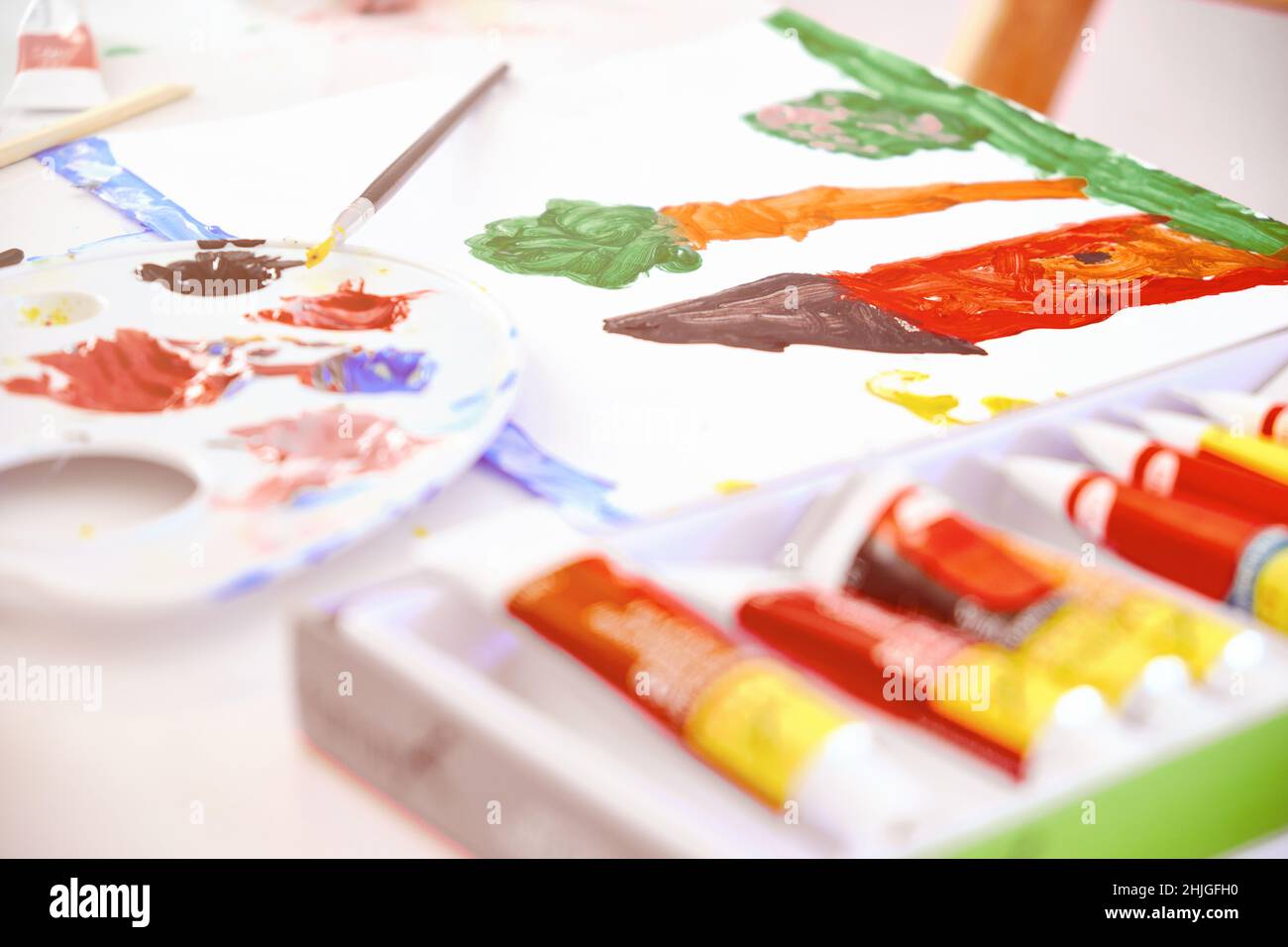 Painting, artist palette and paintbrushes Stock Photo - Alamy