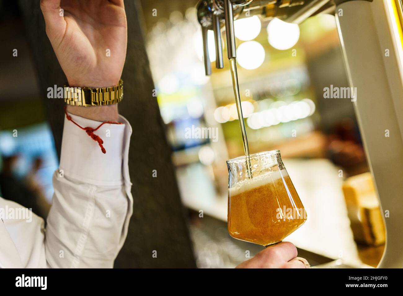 Bartender pouring beer glass foam hi-res stock photography and images ...
