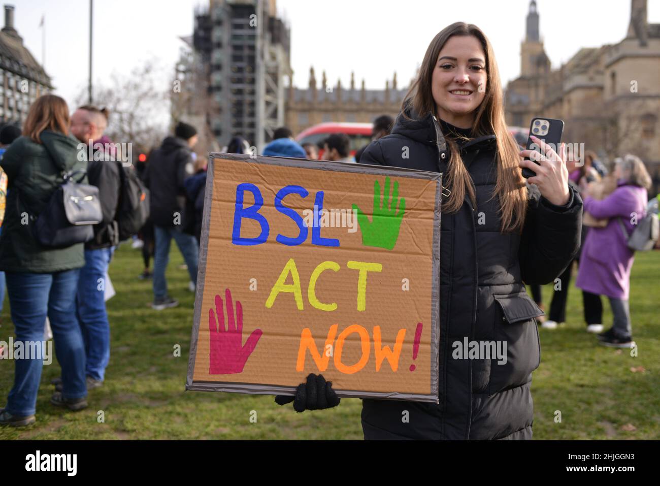 A protester seen holding a placard expressing her opinion during the ...