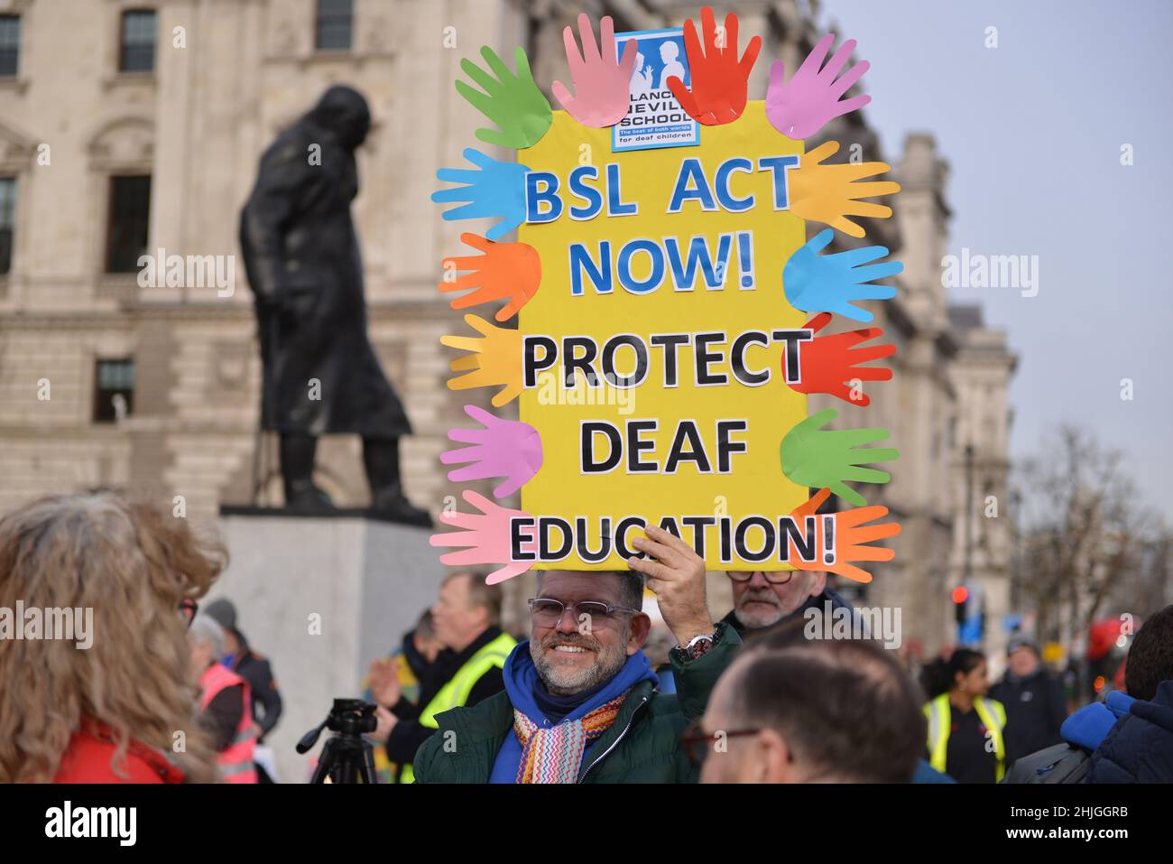 A protester seen holding a placard expressing her opinion during the ...