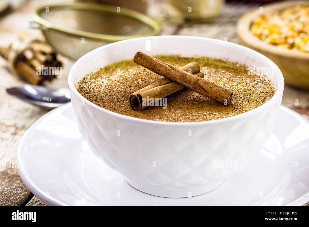 creamy corn jam called curau, typical Brazilian porridge decorated with ...