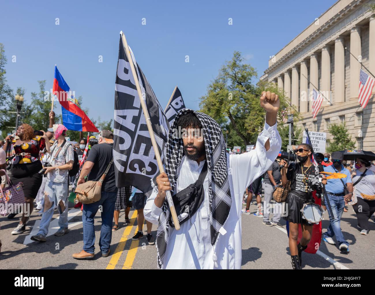 WASHINGTON, D.C. -- August 28, 2021: Demonstrators are seen during the ...
