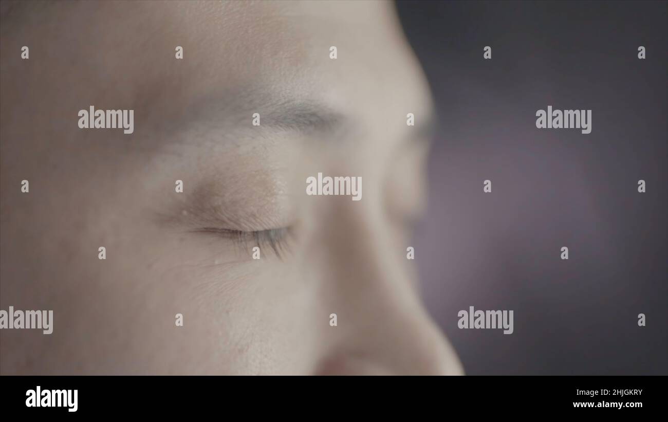Close-up of man closing his brown eyes. Human face Stock Photo - Alamy