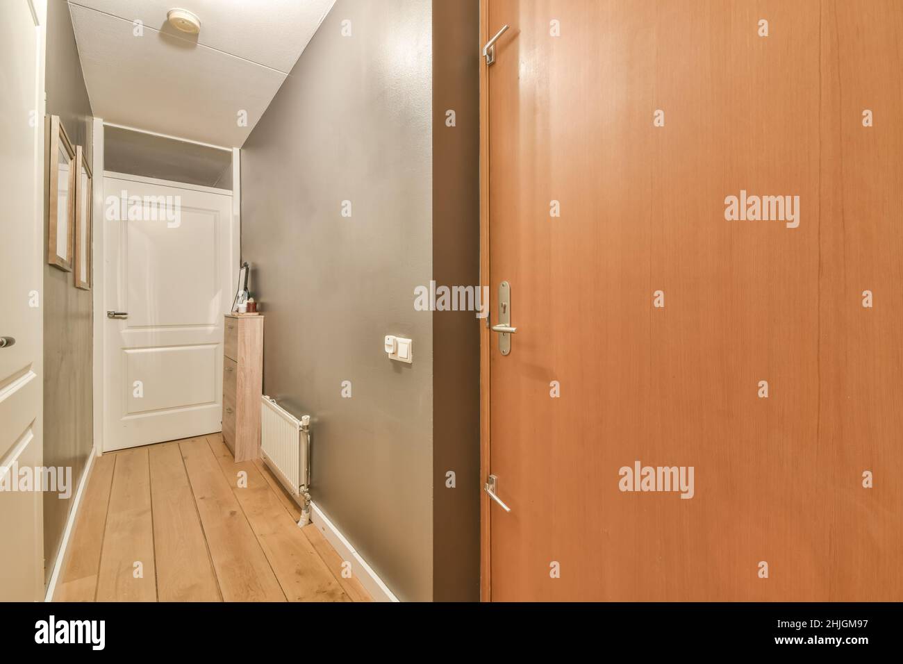 A long empty corridor designed in minimalistic style Stock Photo - Alamy